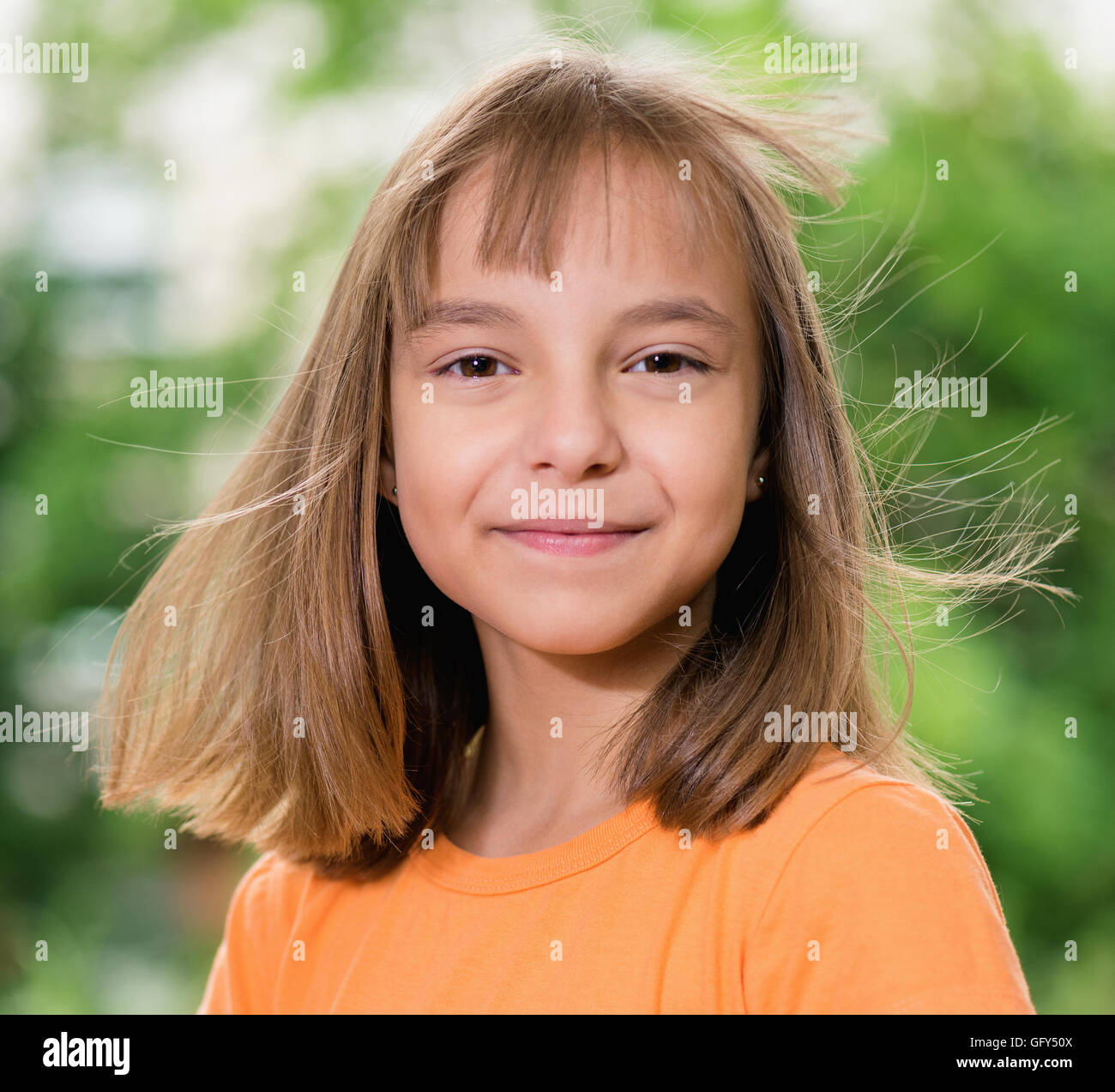 Portrait of smiling girl Stock Photo - Alamy