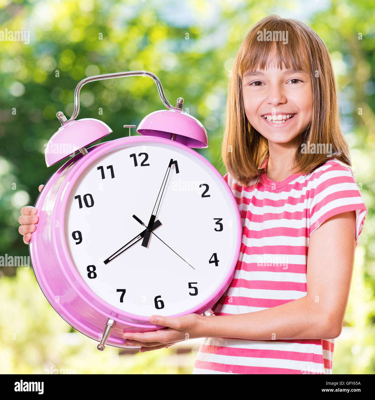 Girl clock hi-res stock photography and images - Alamy