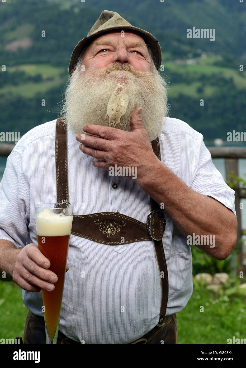 Bearded man Fritz Sendlhofer in leather pants and a traditional shirt ...