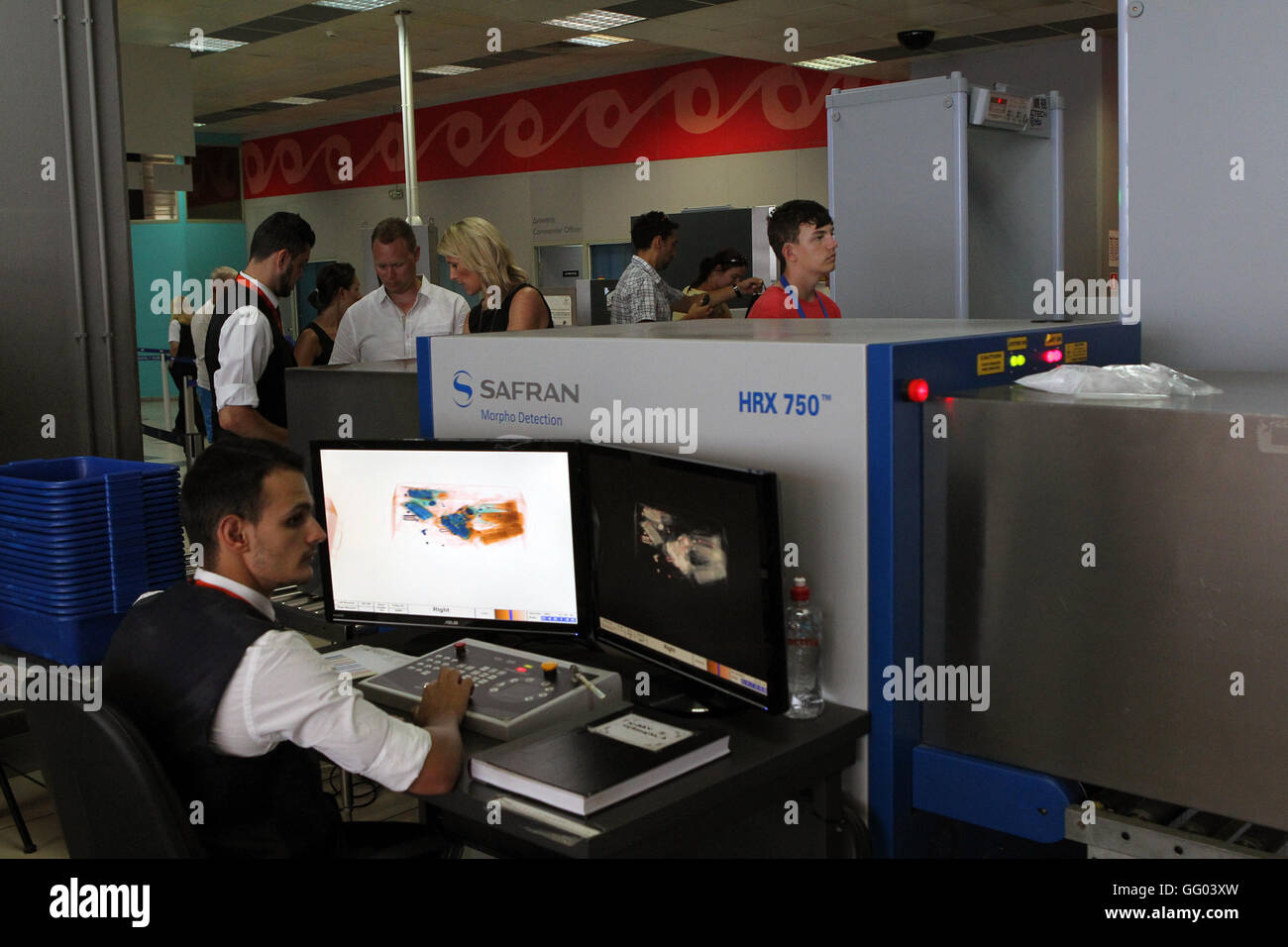 Athens, Greece. 30th July, 2016. A security staff member checks a ...