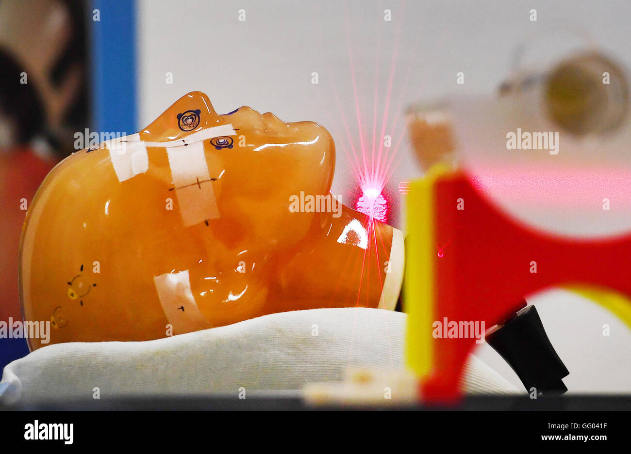 The model of a head is prepared for a test run in the proton therapy ...