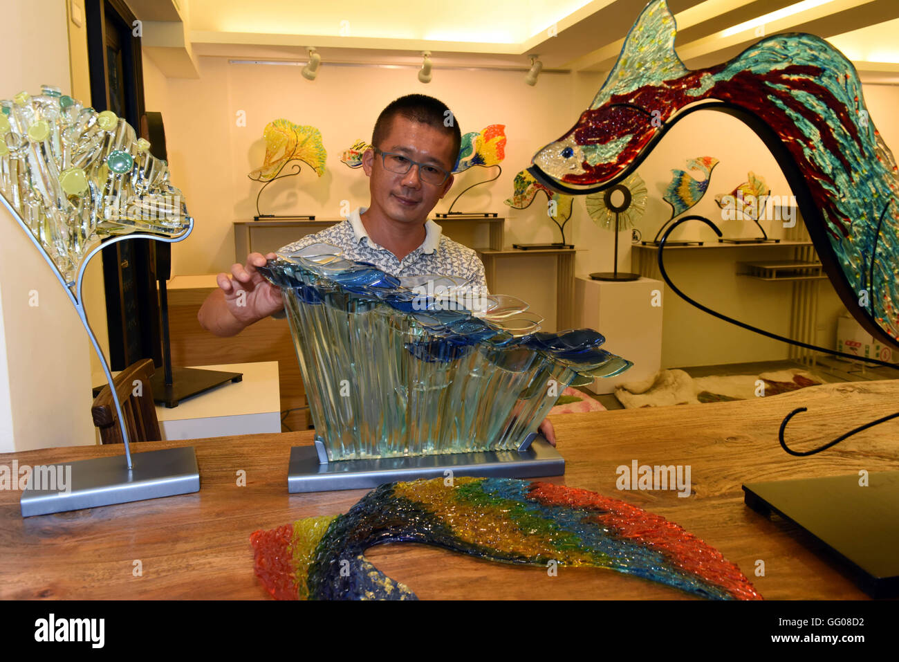 Nantou, China's Taiwan. 2nd Aug, 2016. Coloured glaze artist Lin Fang ...