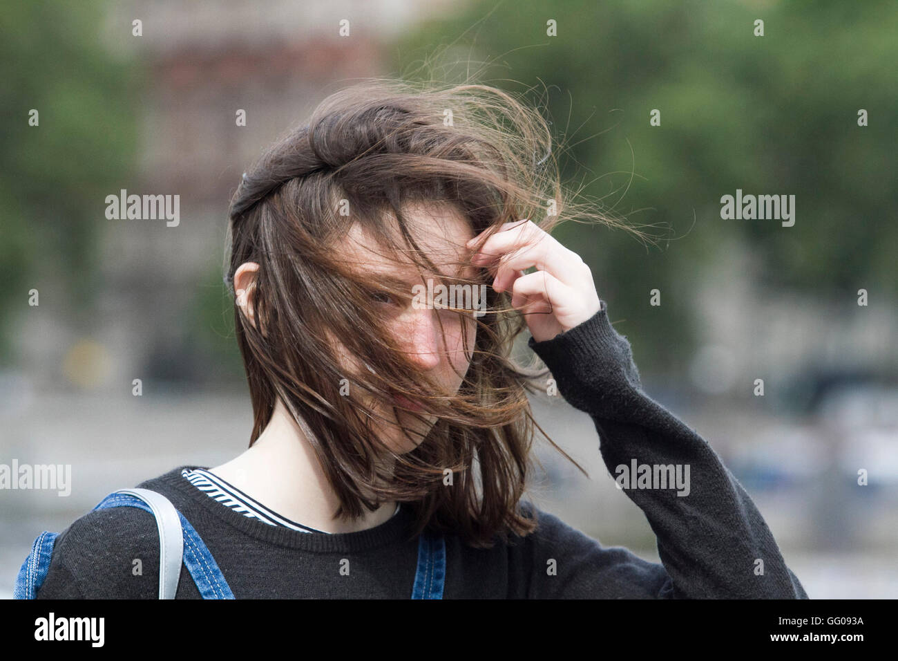 Hair blown in face by wind hi-res stock photography and images - Alamy