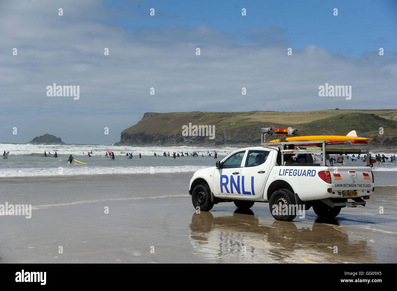 Beach lifeguard, RNLI lifeguards, Polzeath beach, Cornwall, UK Stock ...