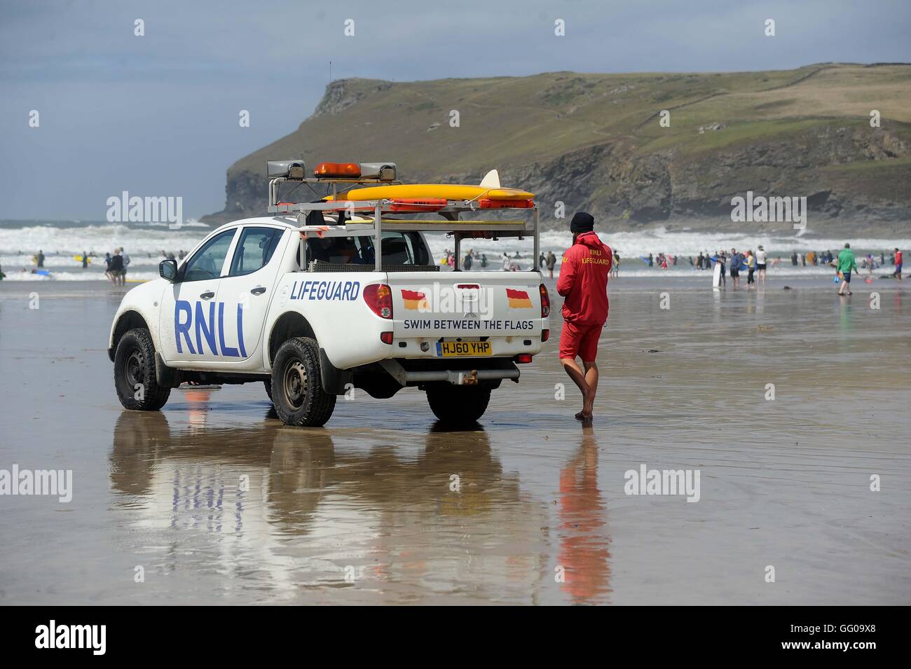 Beach lifeguard, RNLI lifeguards, Polzeath beach, Cornwall, UK Stock ...