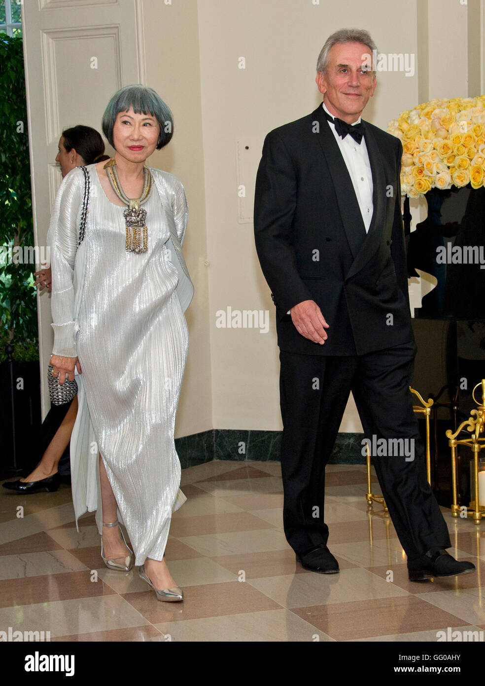 Author Amy Tan and Louis DeMattei arrive for the State Dinner honoring ...