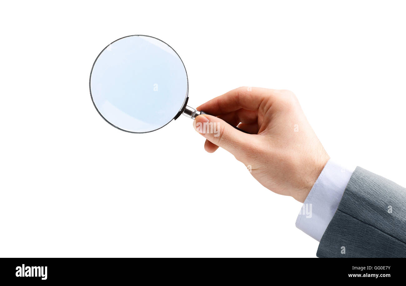 Magnifying glass in hand Stock Photo - Alamy