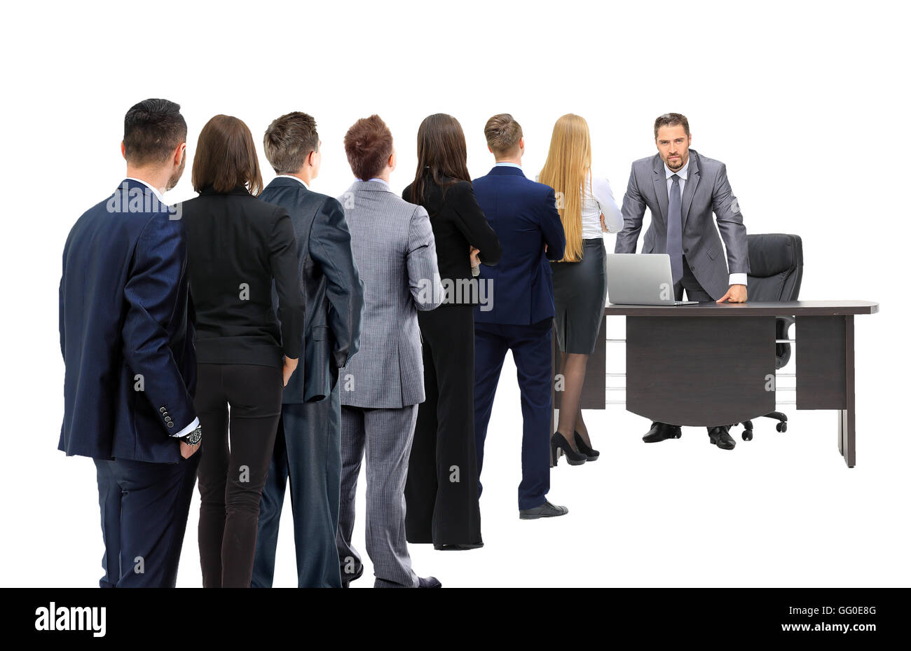 Business people looking at boss standing back side Stock Photo - Alamy