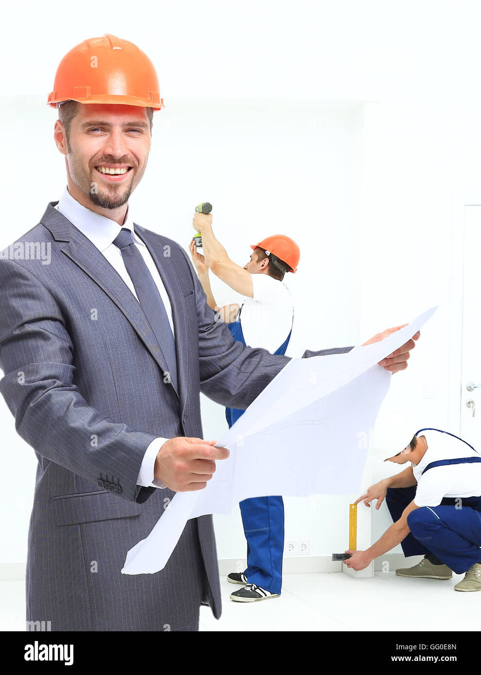 Architects working on construction project Stock Photo - Alamy