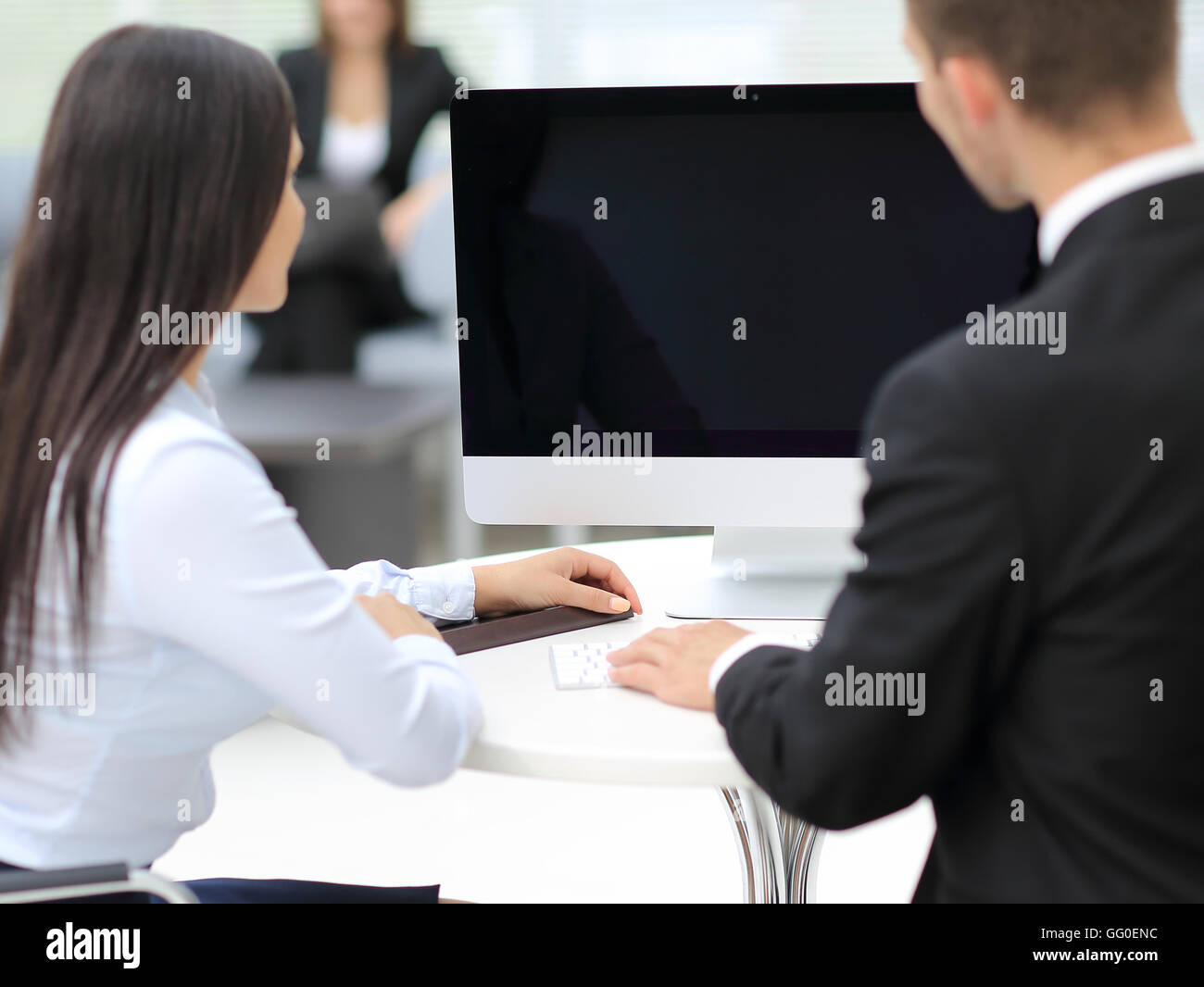 Business meeting at the table with computer Stock Photo - Alamy