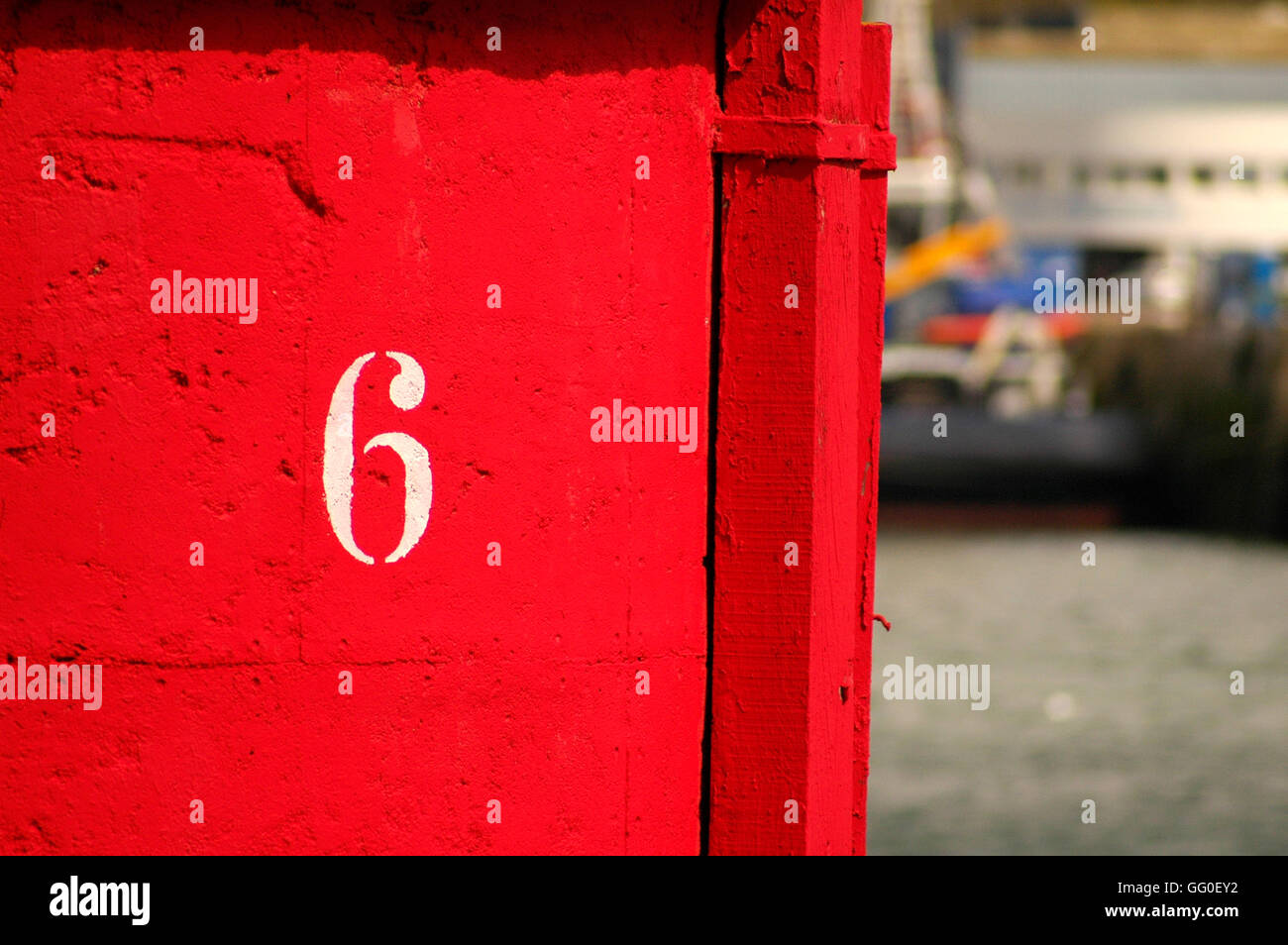 Number 6 on a beach hut Stock Photo - Alamy