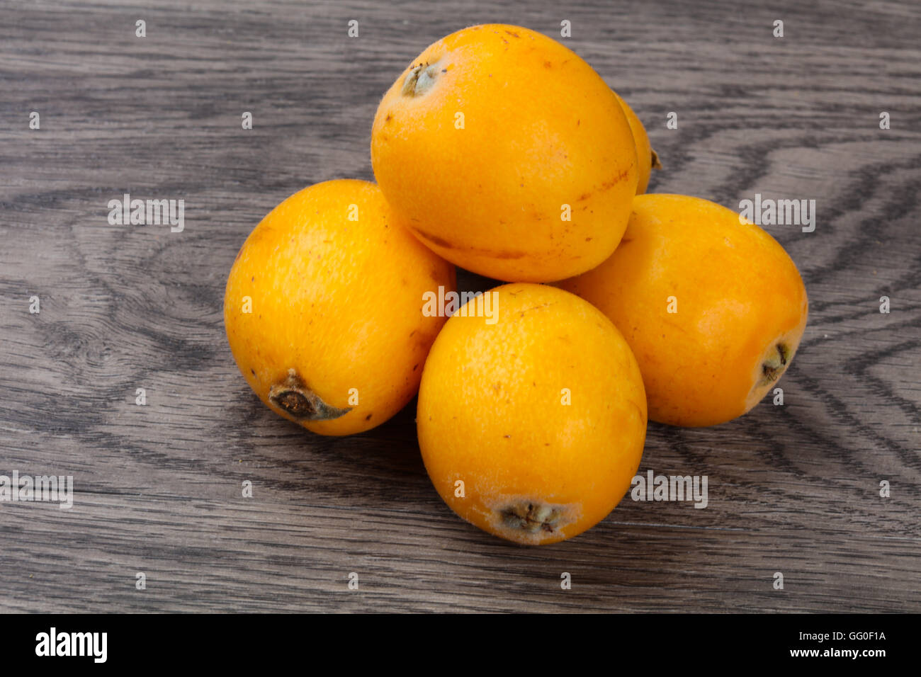 Fresh ripe Meldar on the wood background Stock Photo - Alamy
