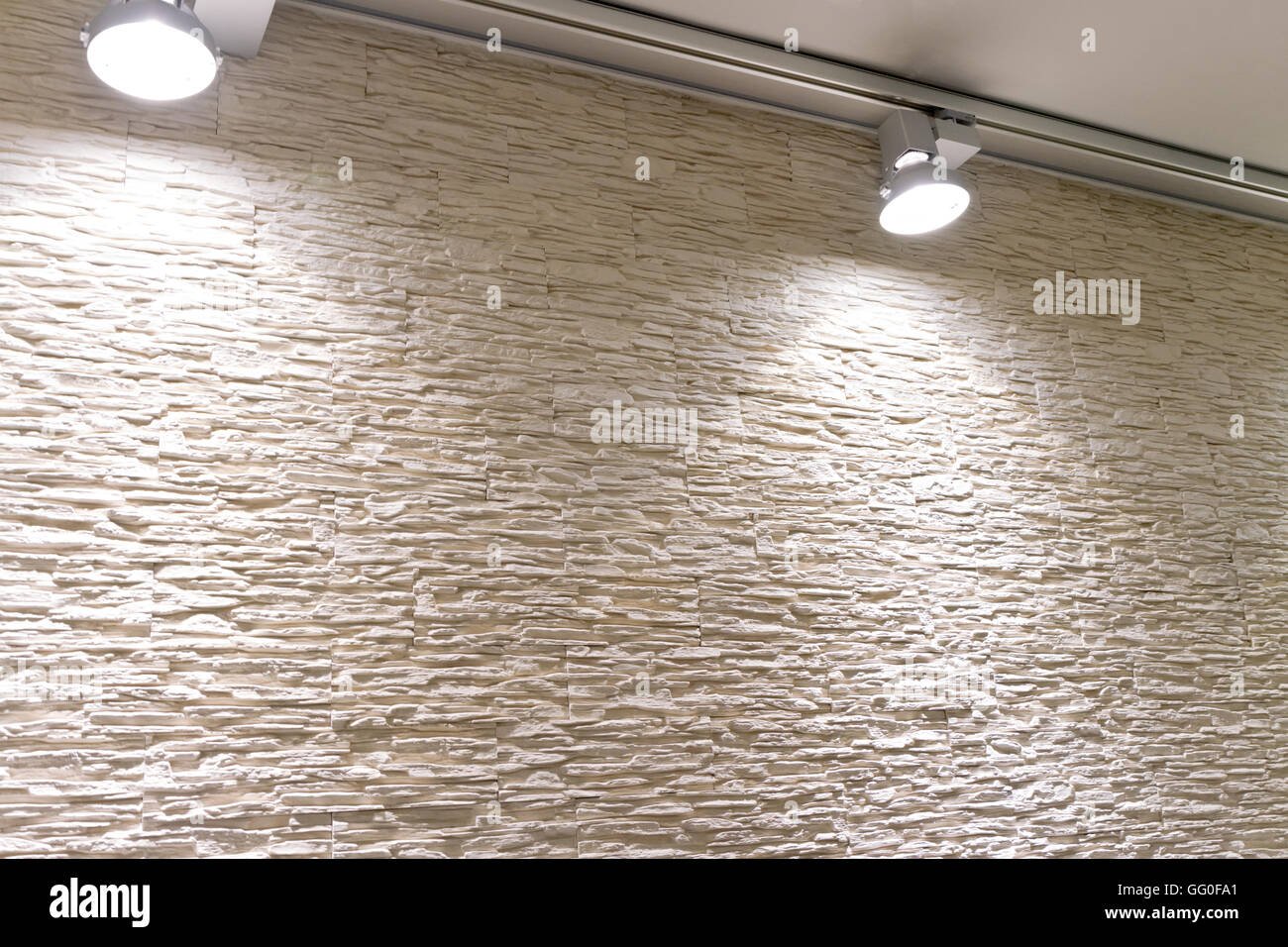 Exhibition wall of an art gallery with two spotlights Stock Photo - Alamy