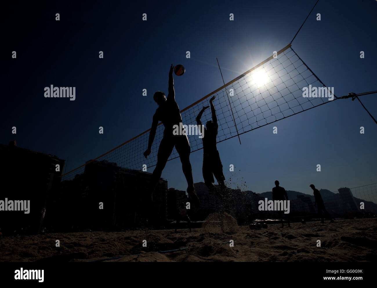 People play volleyball on copacabana beach ahead rio olympic games hi ...