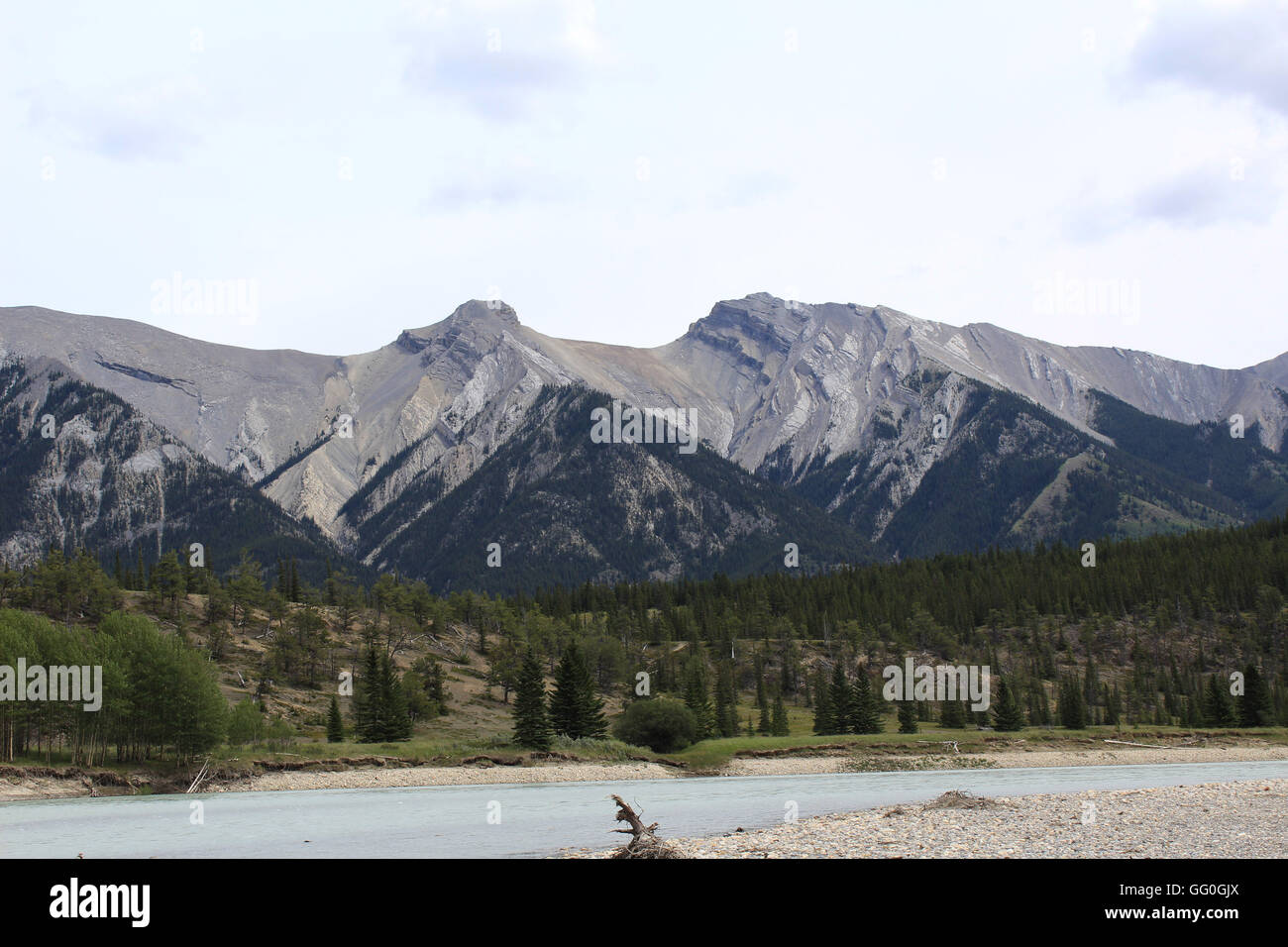 Mountain and riverscape near david thompson Stock Photo - Alamy