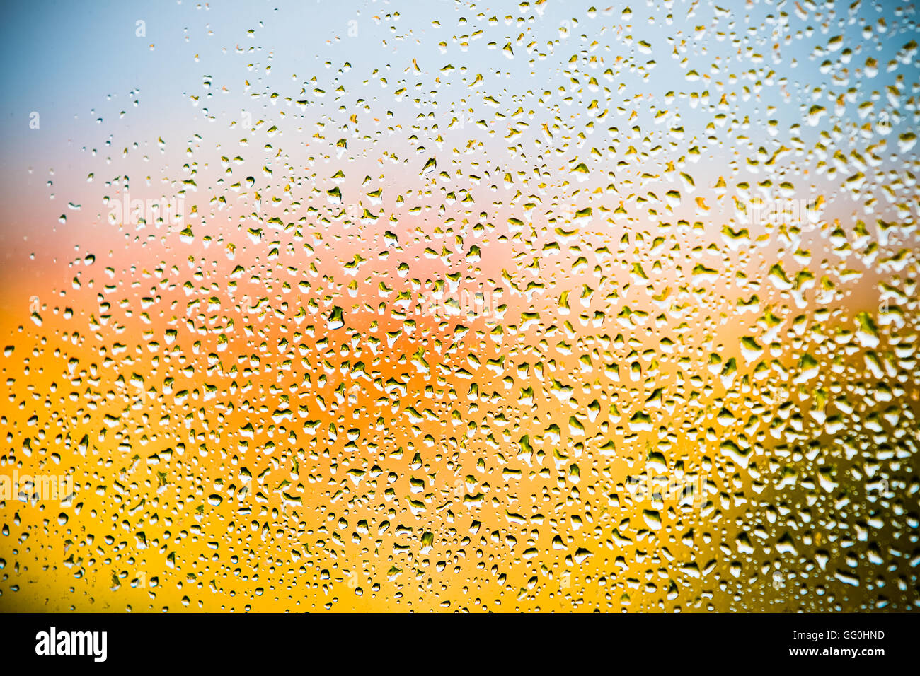 Rain drops on a window as an abstract background Stock Photo - Alamy