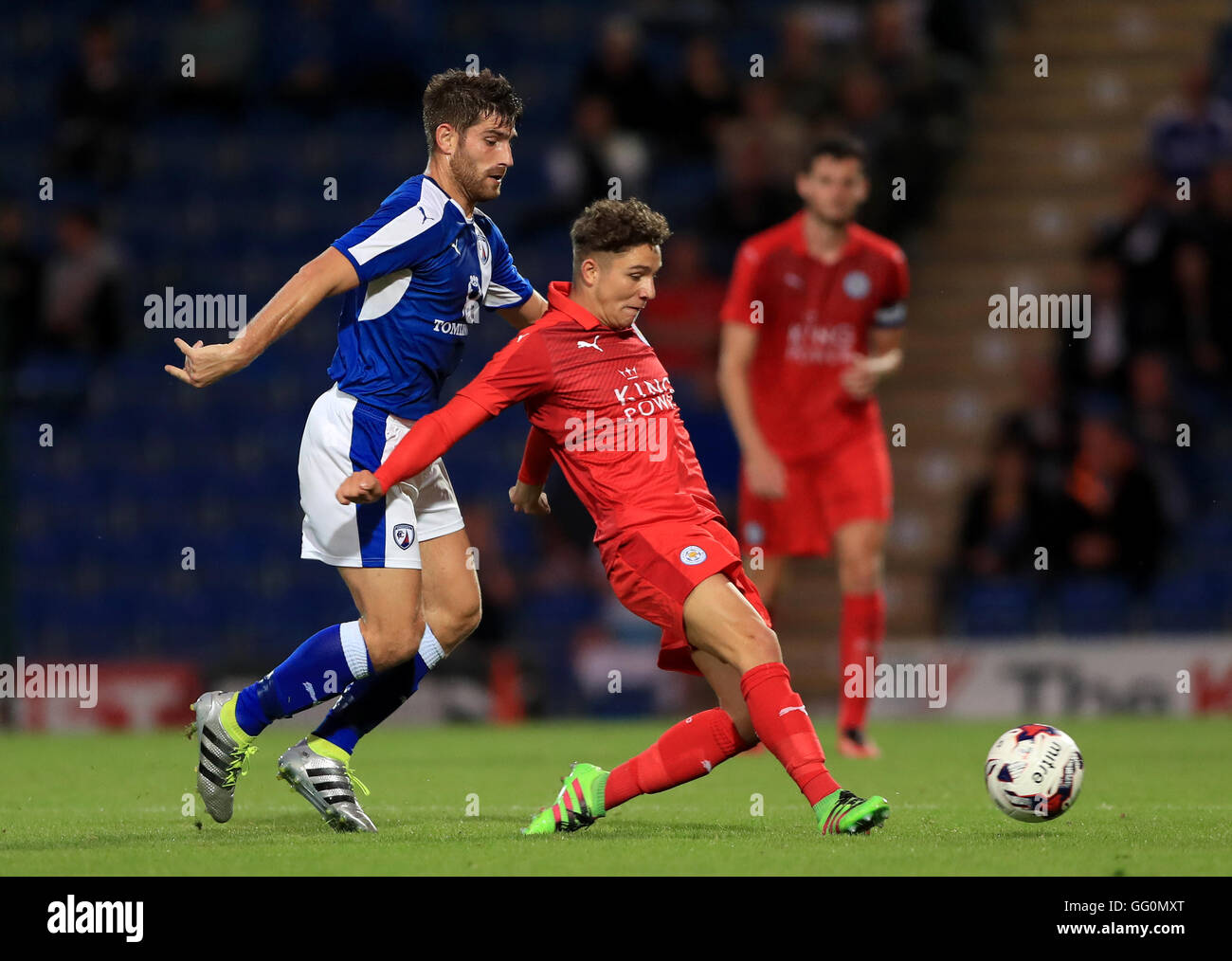 Chesterfield's Ched Evans (left) and Leicester City's Matt Miles battle ...