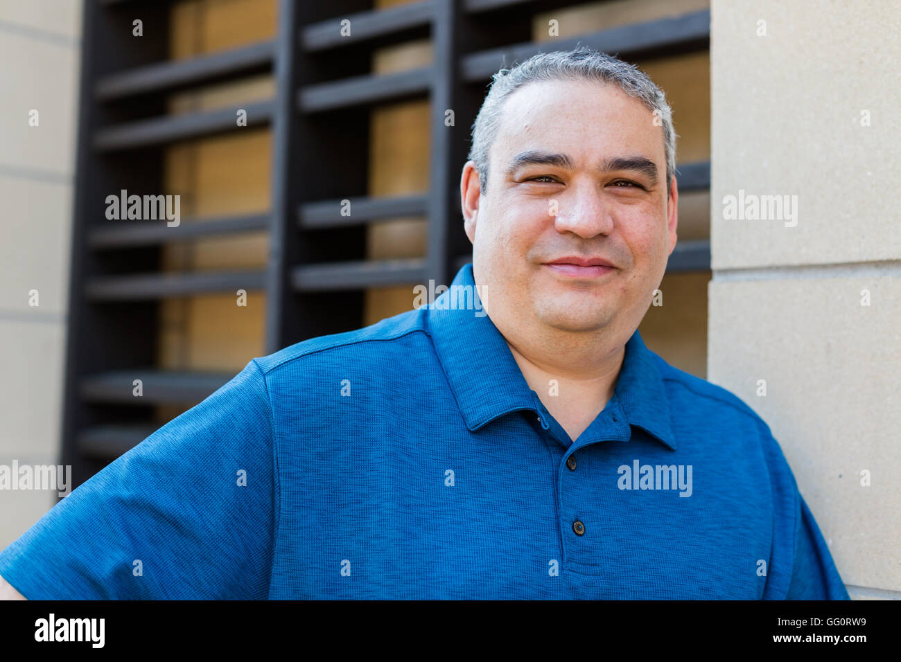Businessman posing for business portrait Stock Photo - Alamy