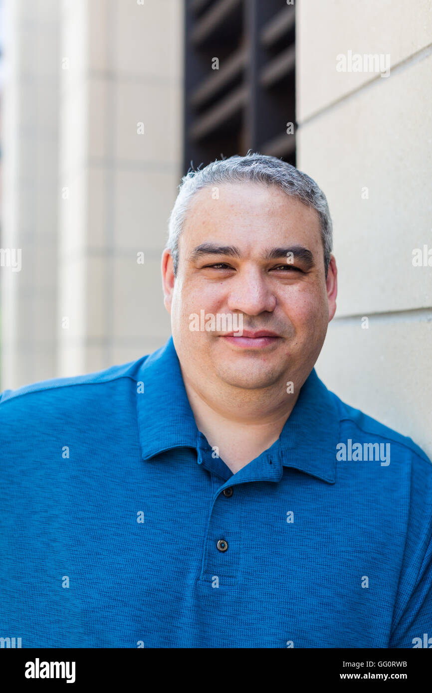 Businessman posing for business portrait Stock Photo - Alamy