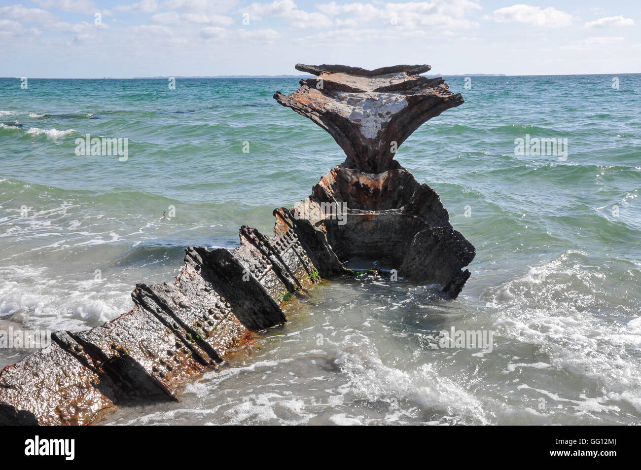 Old rusted shipwreck partially submerged at CY O'Connor Beach and the ...