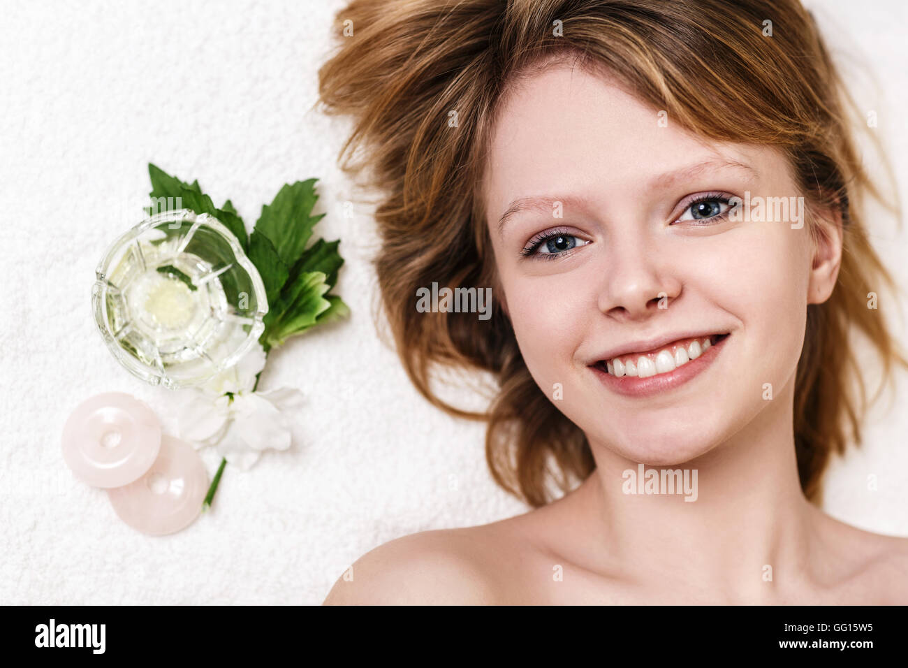 Atractive young girl relaxing in spa salon Stock Photo - Alamy