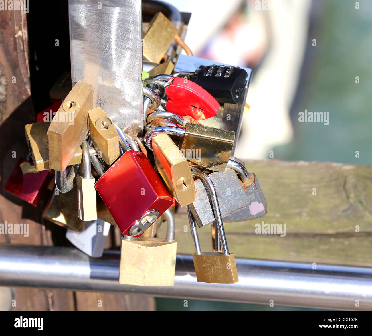 many padlocks of lovers installed on the city bridge Stock Photo - Alamy