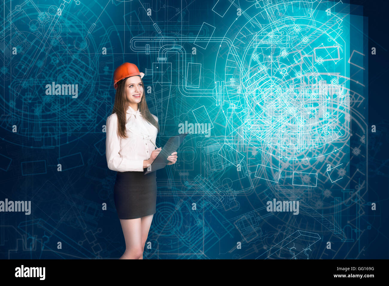 Young woman engineer looking at project sketch Stock Photo - Alamy