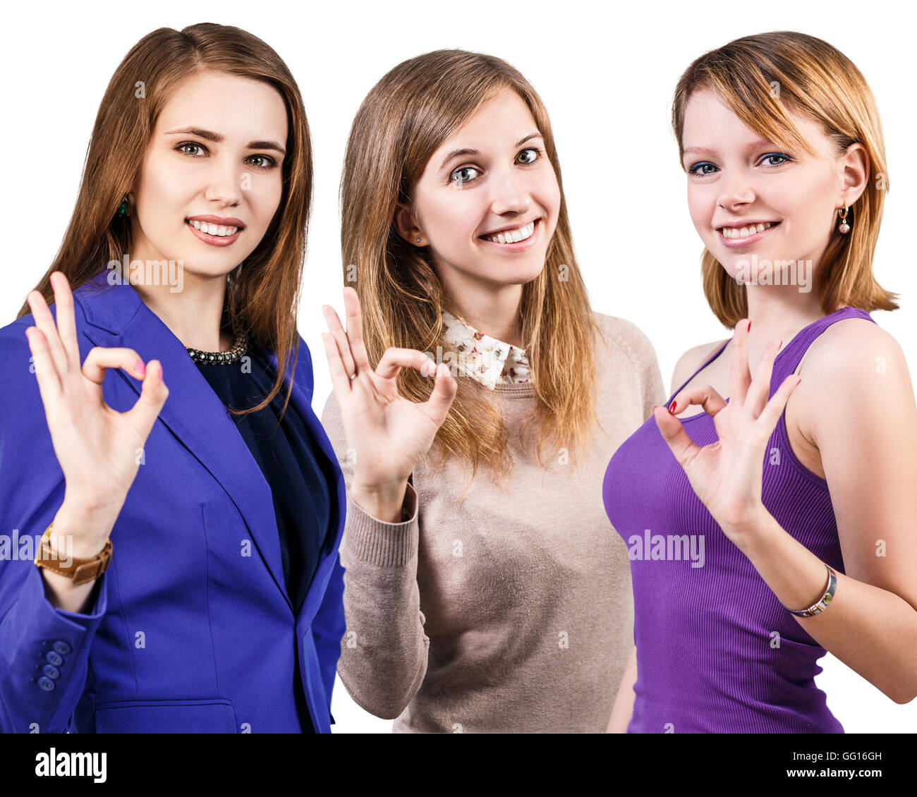 Three young women showing OK sign Stock Photo - Alamy