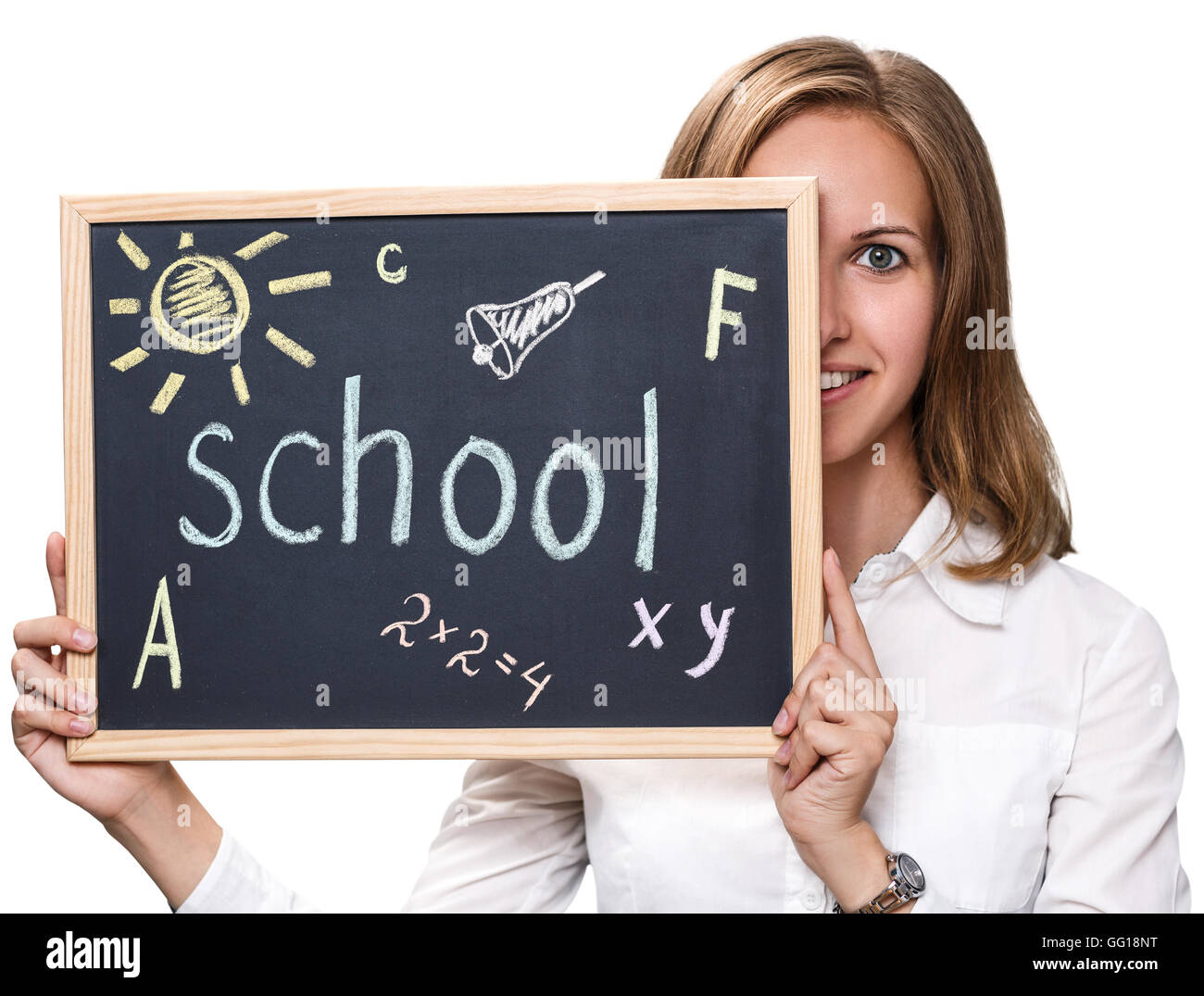 Young pretty girl holding and presents chalkboard school note isolated ...