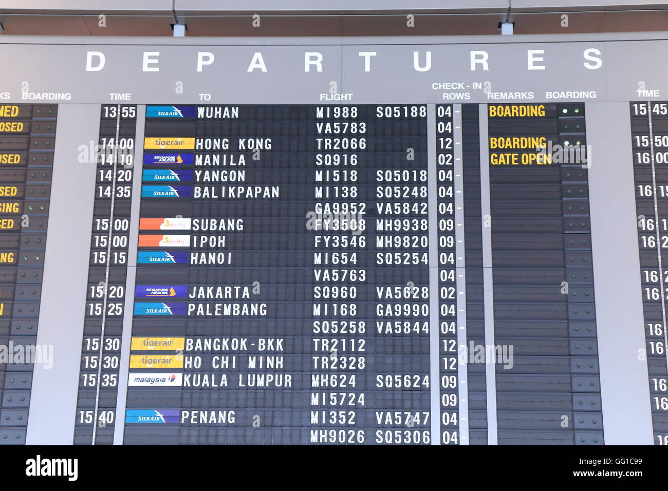 Changi Airport departure timetable in Singapore Stock Photo - Alamy