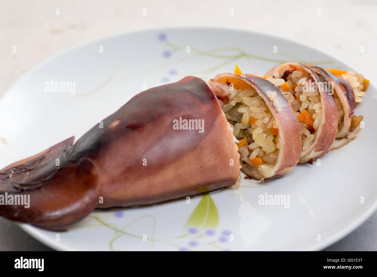 Japanese cuisine: Sticky rice stuffed steamed squid called an Ikameshi ...
