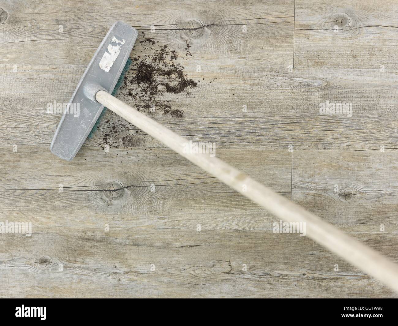 A studio photo of a broom cleaning up Stock Photo - Alamy
