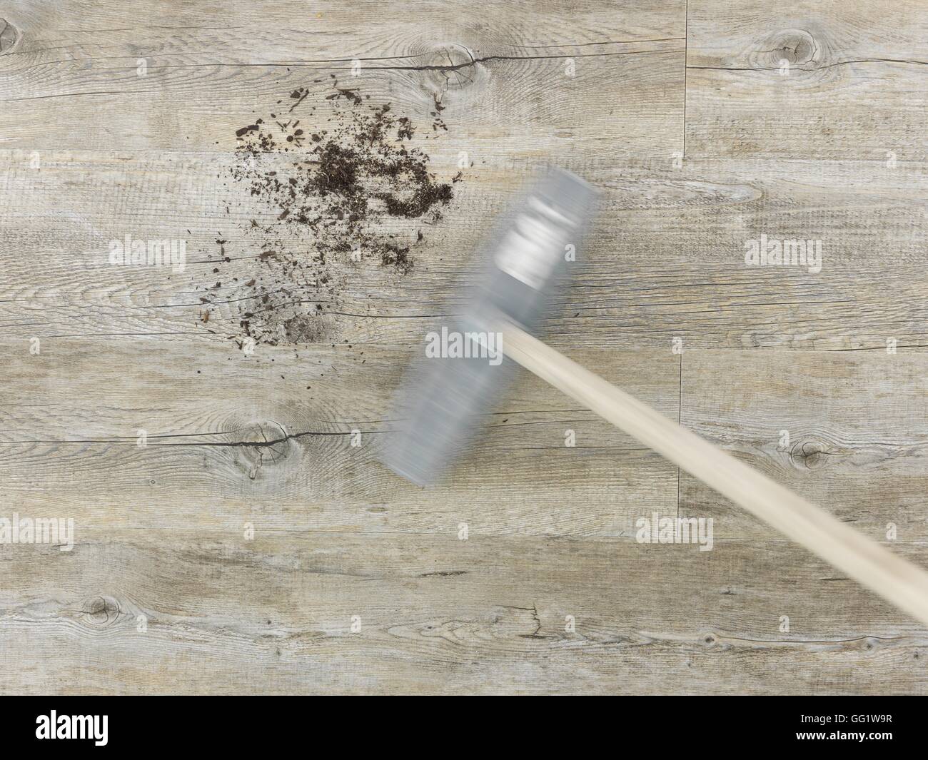 A studio photo of a broom cleaning up Stock Photo - Alamy