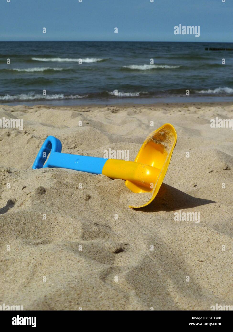 scoop the sand Stock Photo - Alamy