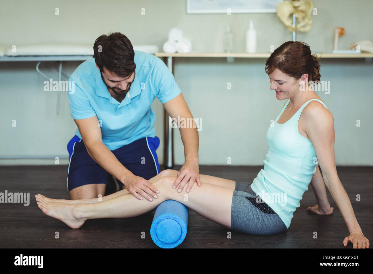 Young woman stretching using foam hi-res stock photography and images ...