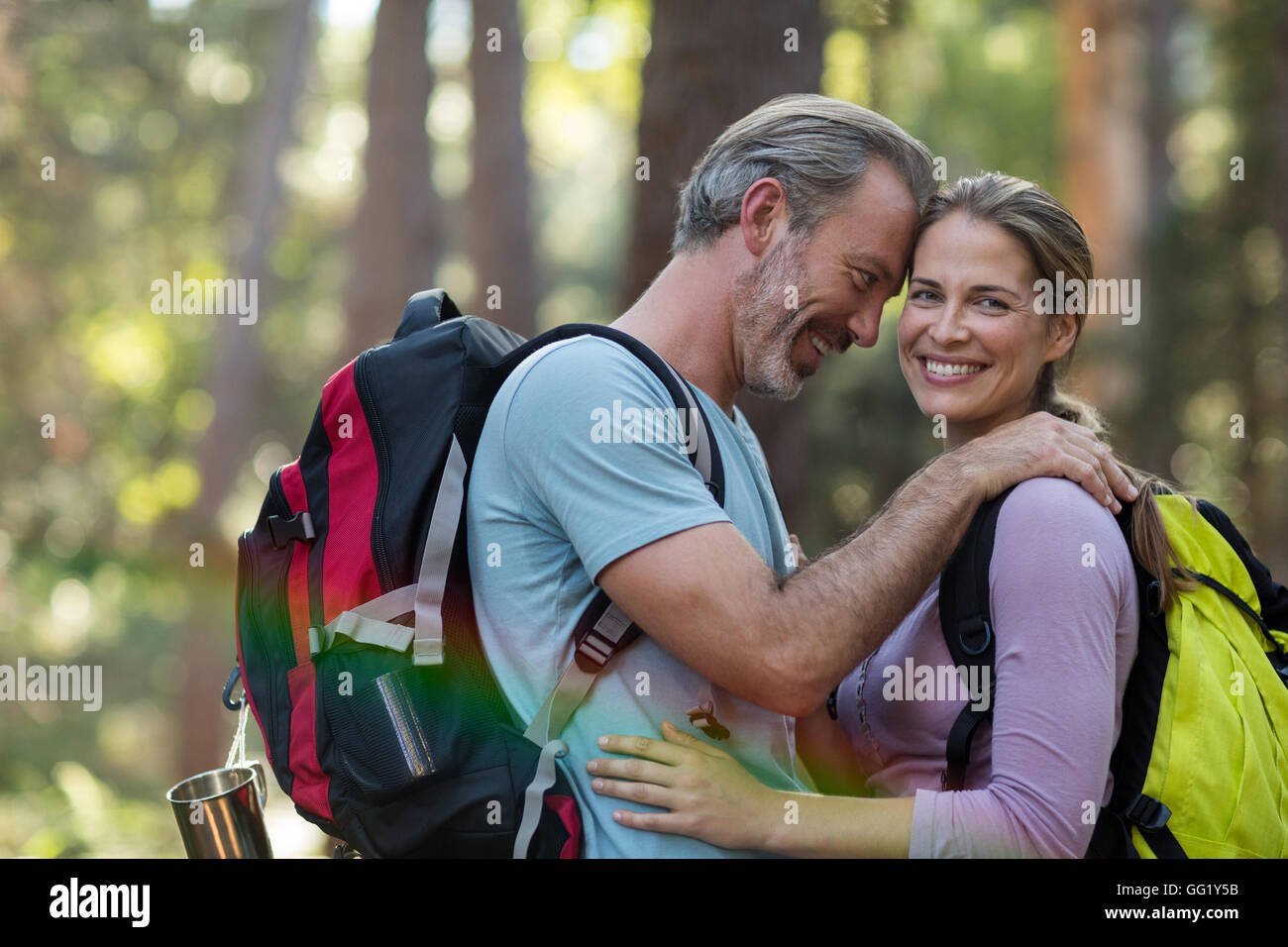 Romantic hiker couple embracing each other Stock Photo - Alamy