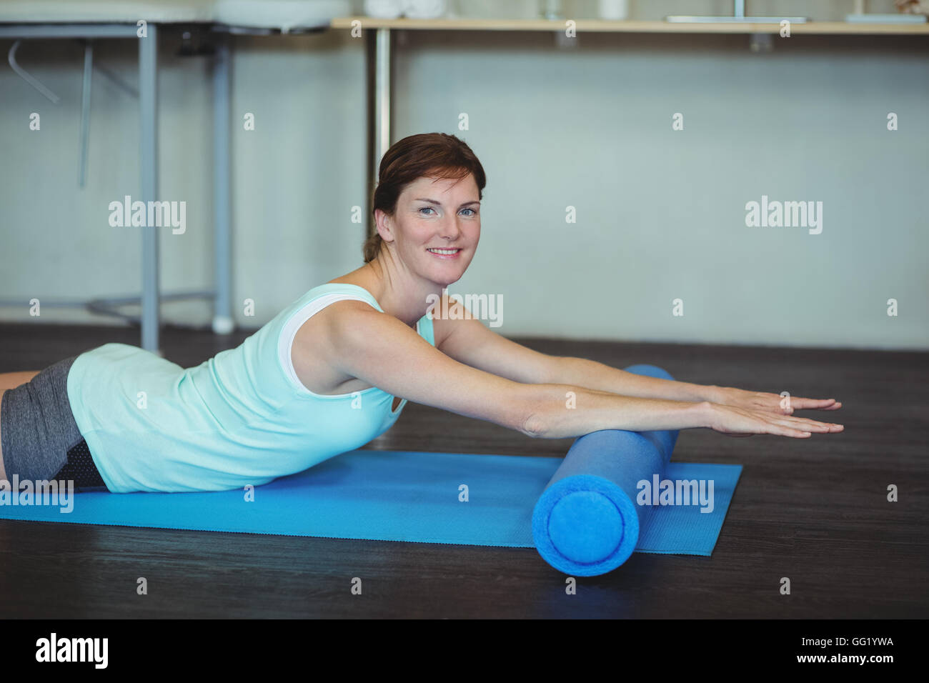 Portrait of woman performing stretching exercise Stock Photo - Alamy
