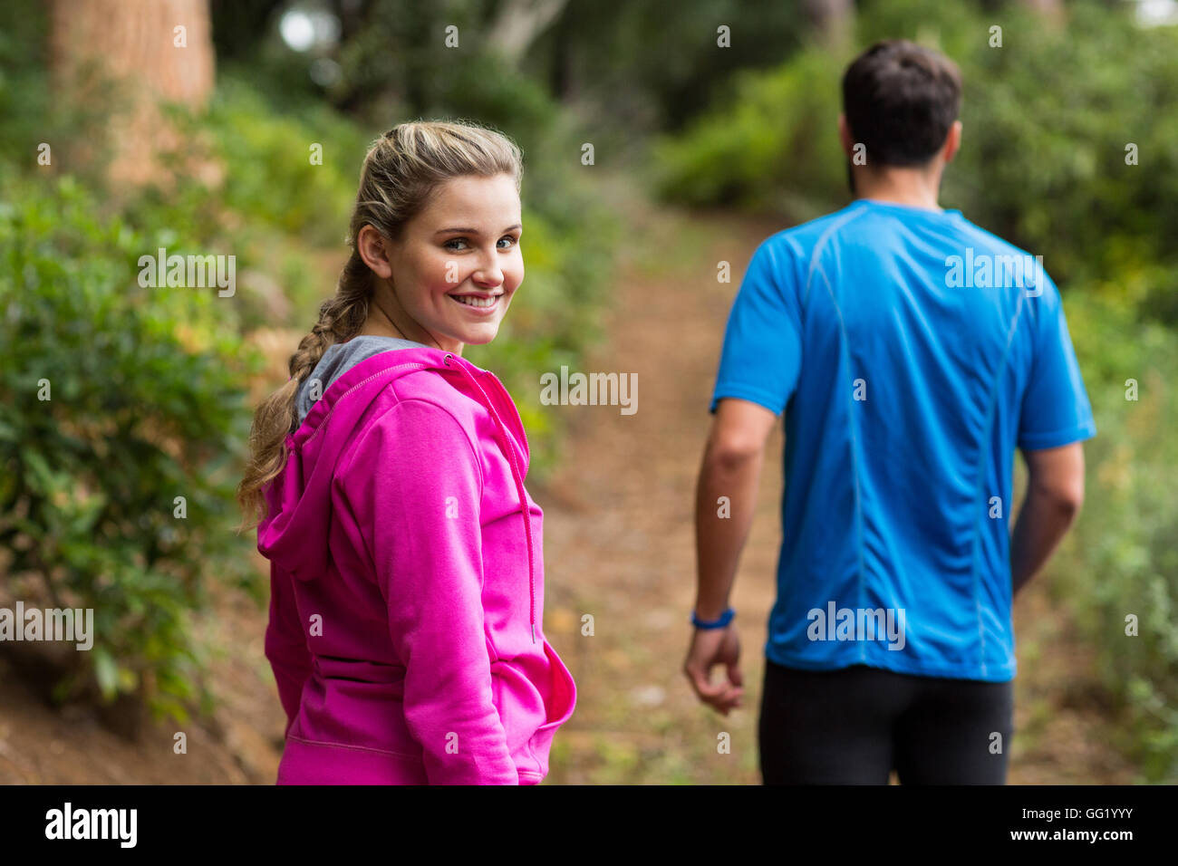 Woman looking back hi-res stock photography and images - Alamy