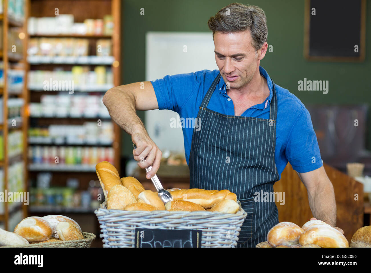 Male staff working at bakery store Stock Photo - Alamy