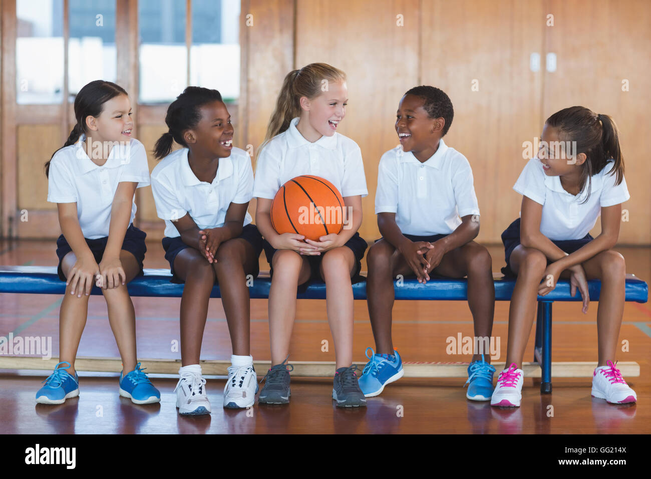 School kids having fun in basketball court Stock Photo - Alamy