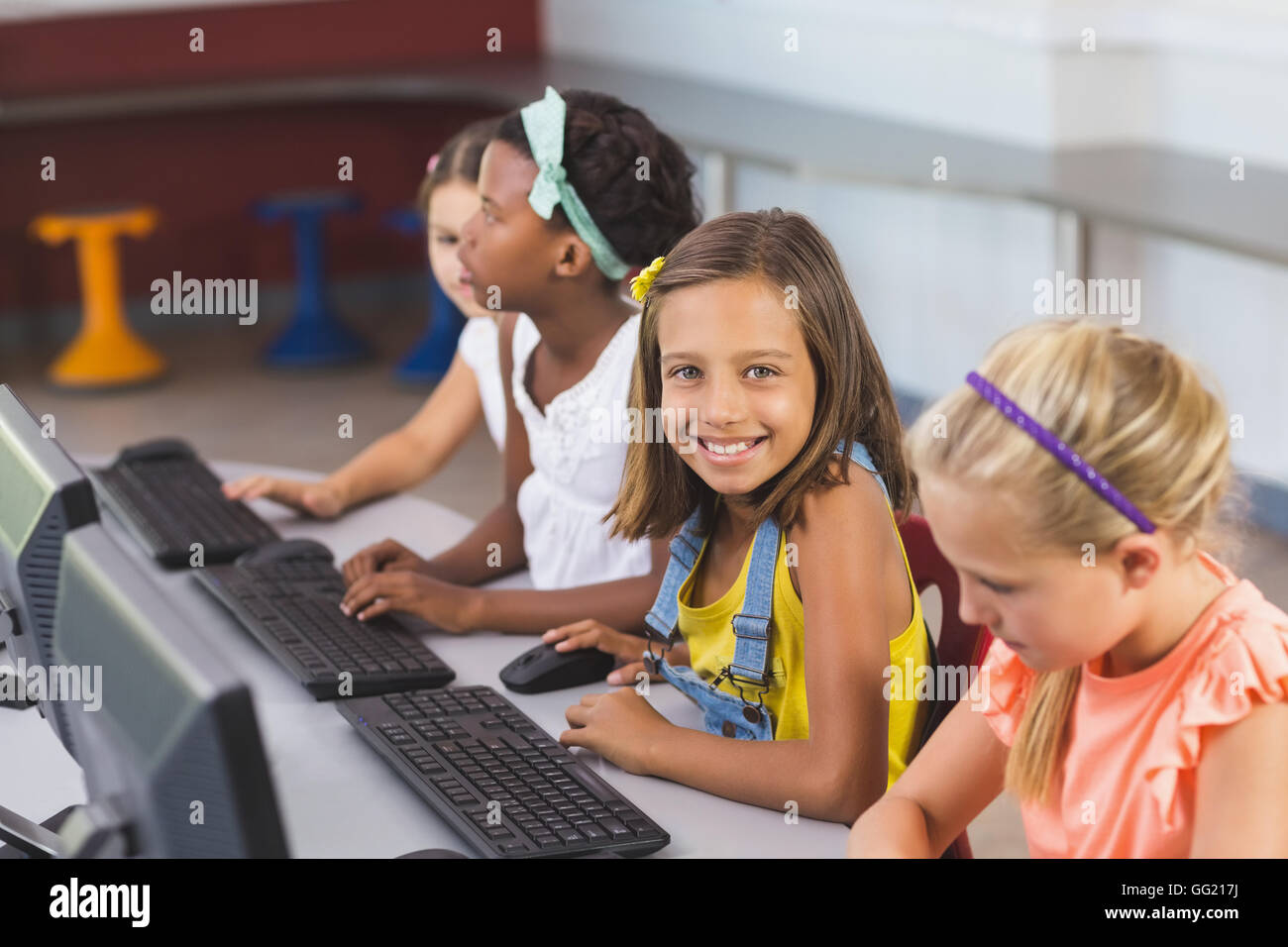 Schoolgirl In Class Using Computer Stock Photos & Schoolgirl In Class ...