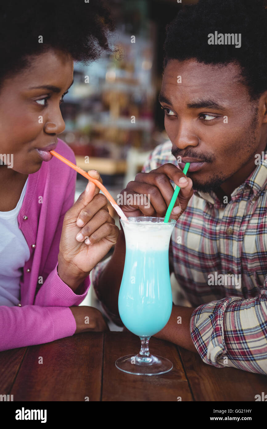 Young couple having mocktail Stock Photo - Alamy