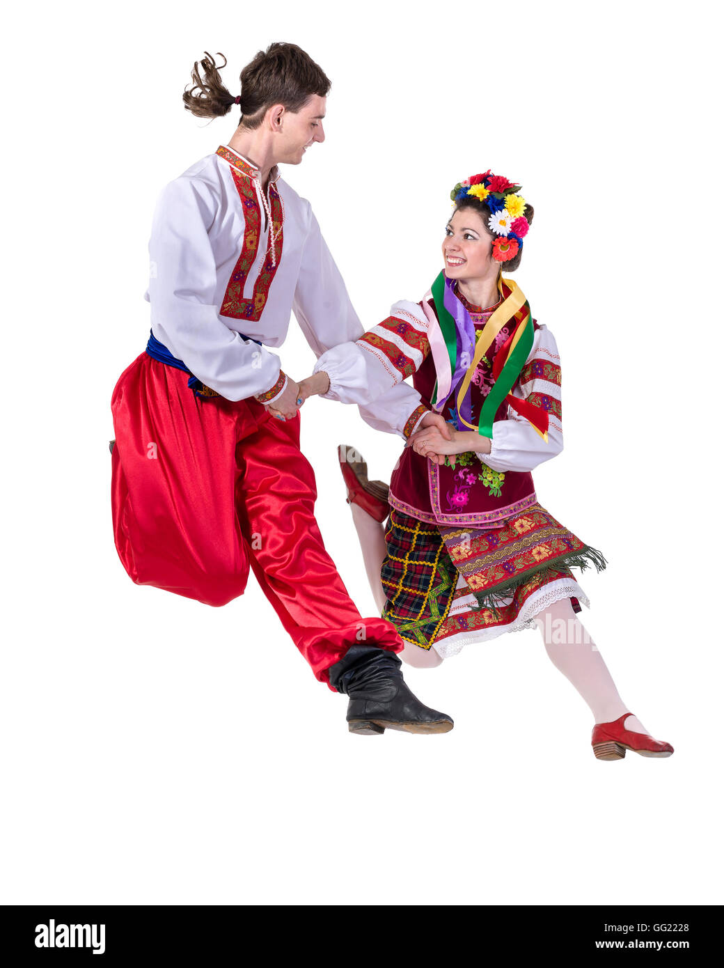 dancing couple in polish national traditional costume jumping, full ...