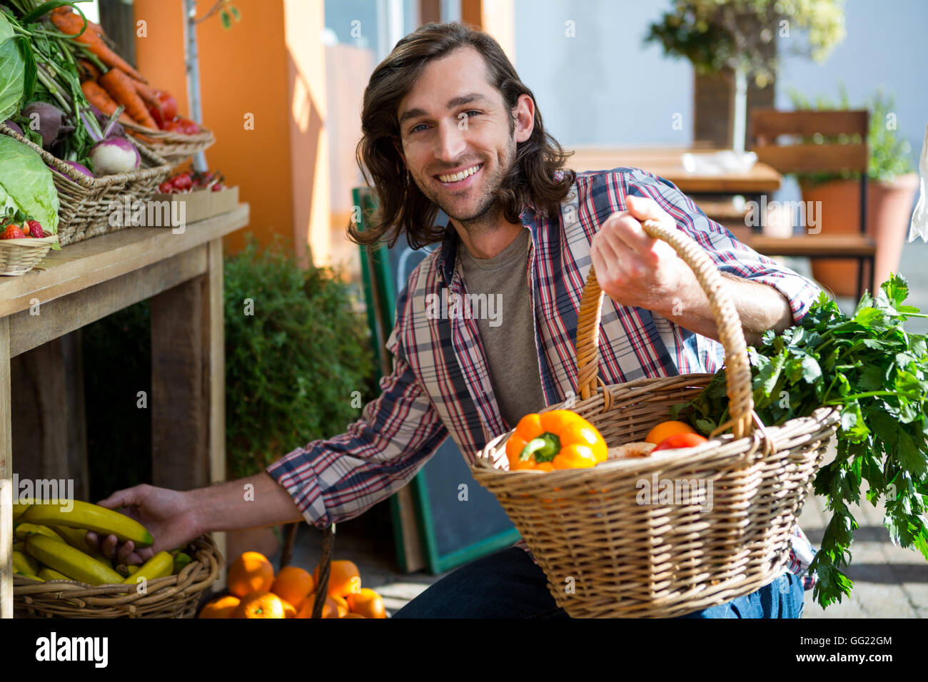 Man buying fruits and vegetables in organic shop Stock Photo - Alamy