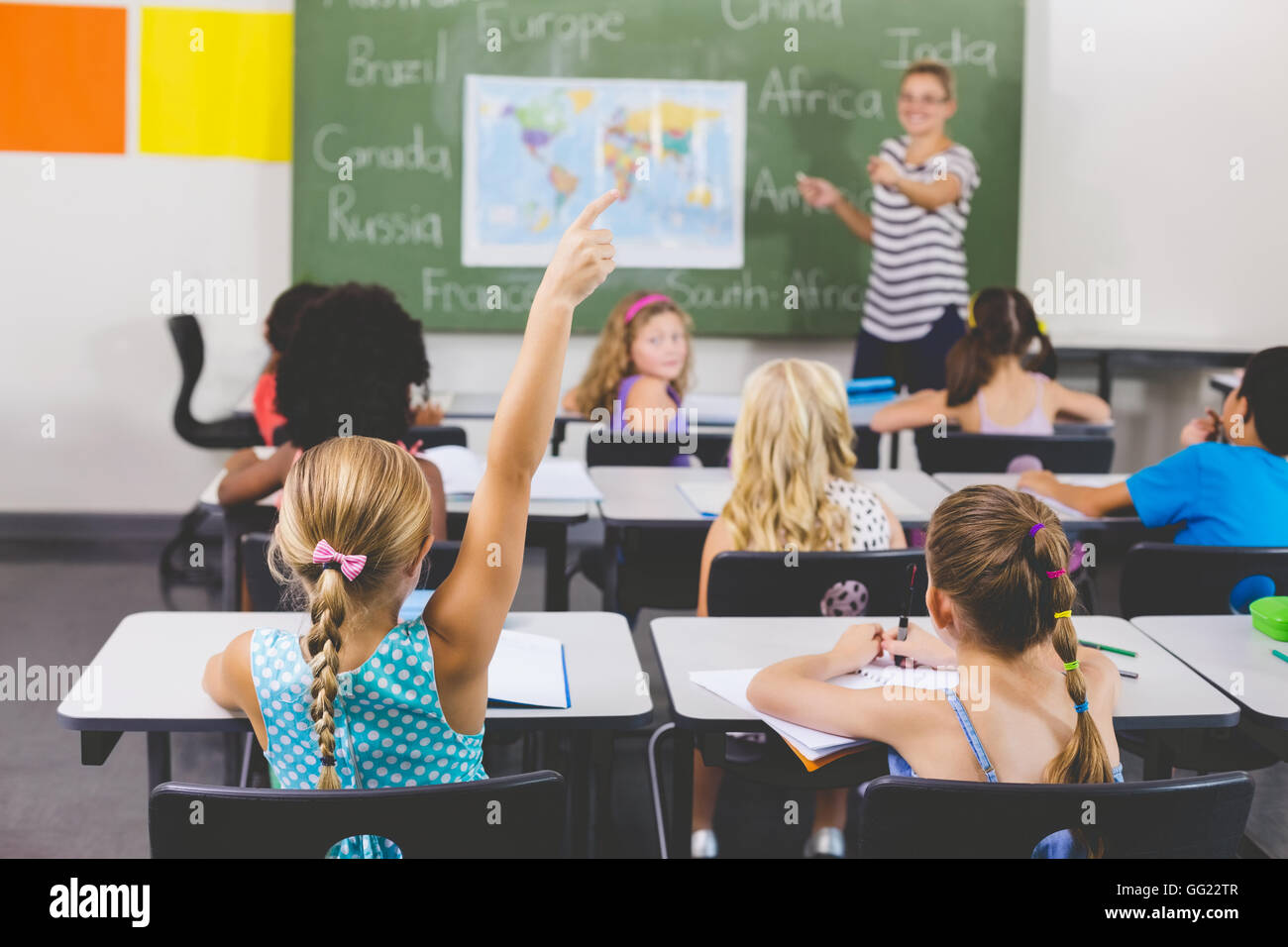 Asian girl raising hand in hi-res stock photography and images - Alamy