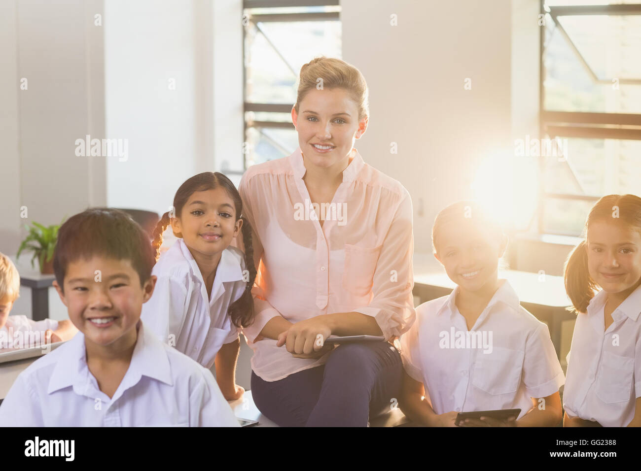 Teacher with students in classroom hi-res stock photography and images ...