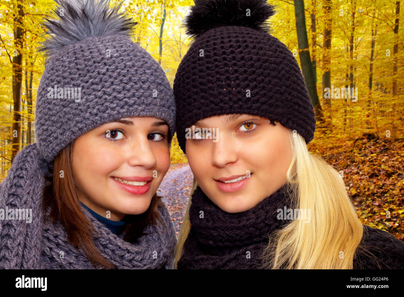 Two girls in autumn Stock Photo - Alamy