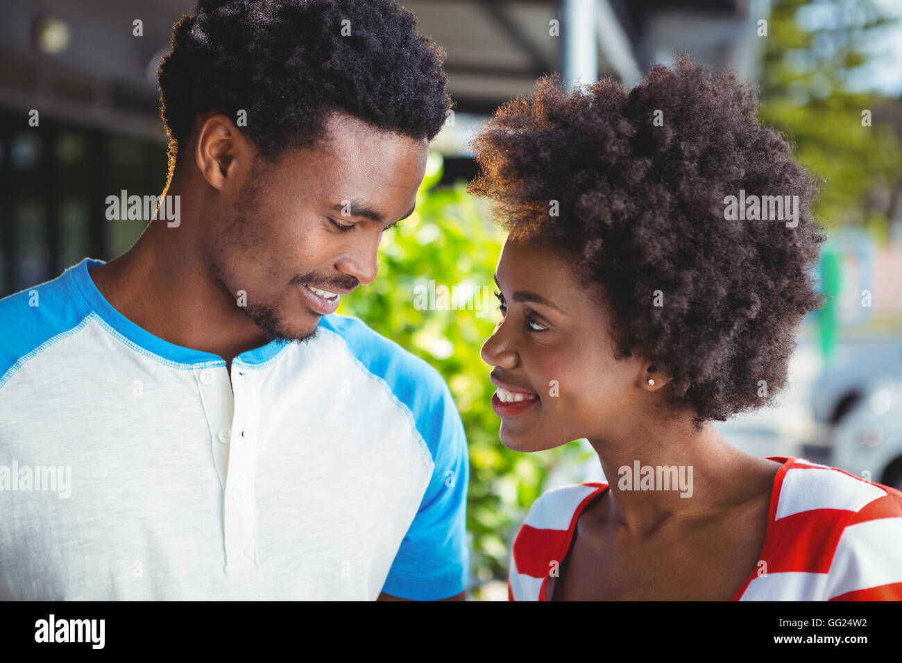 Happy couple looking at each other Stock Photo - Alamy