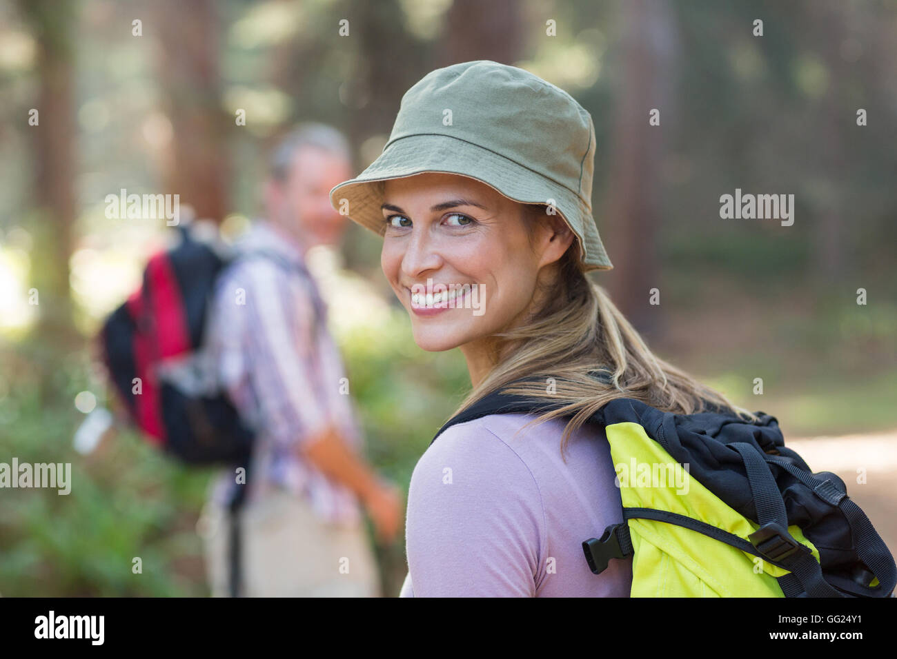 Portrait of hiker hiking in forest Stock Photo - Alamy