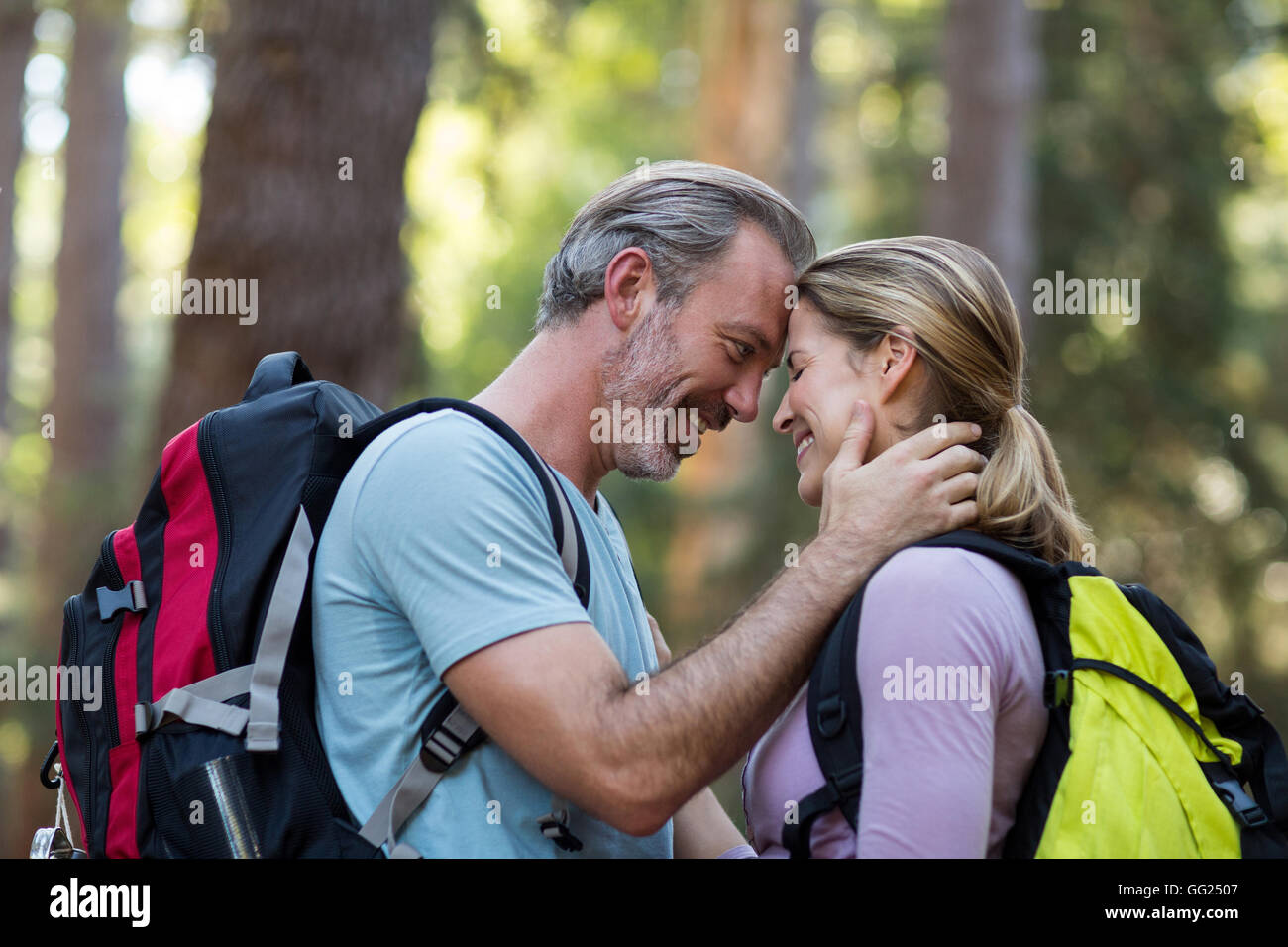 Romantic hiker couple embracing each other Stock Photo - Alamy